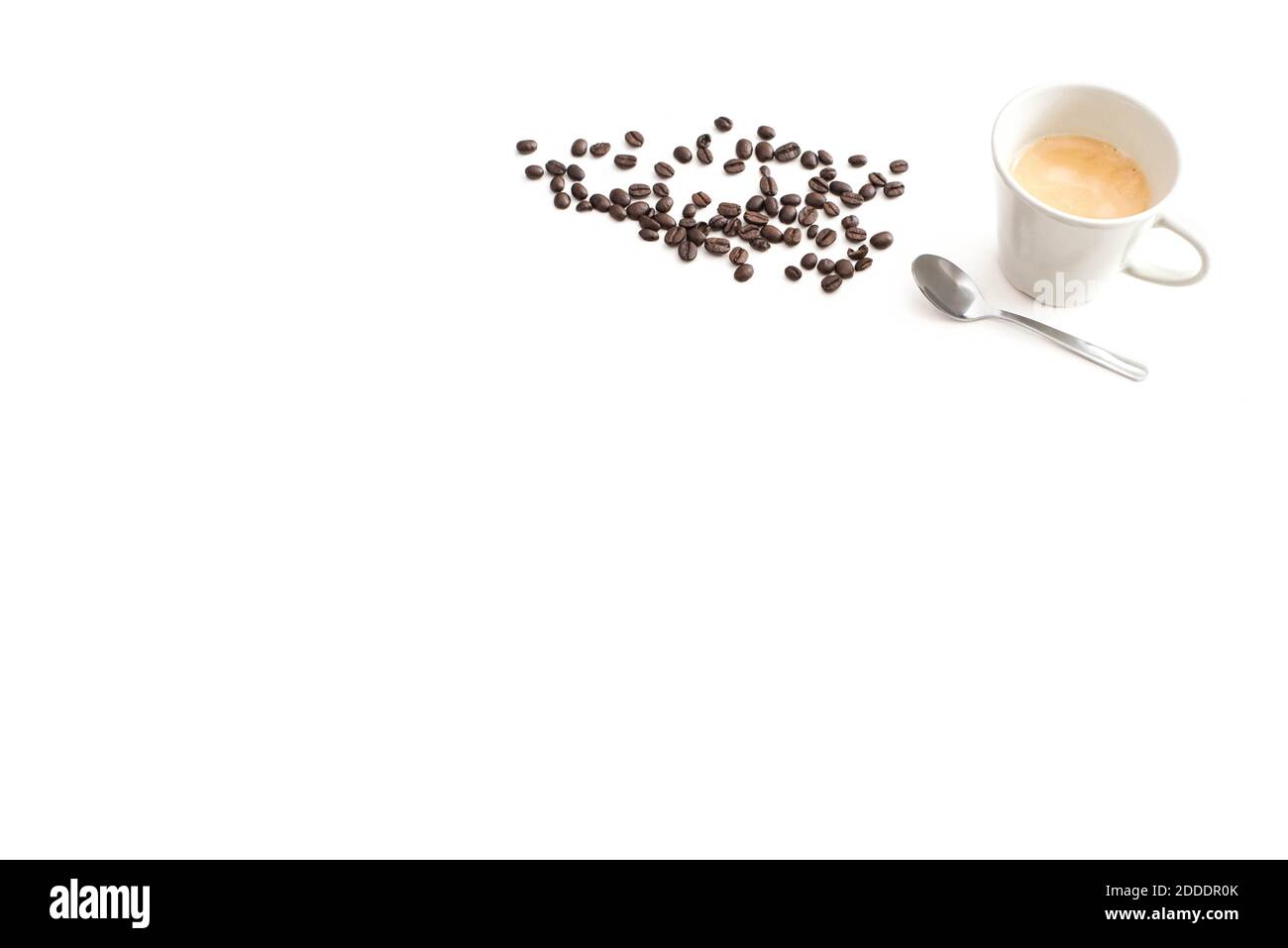 Simple coffee background, roasted coffee beans, cup of coffee and spoon ...