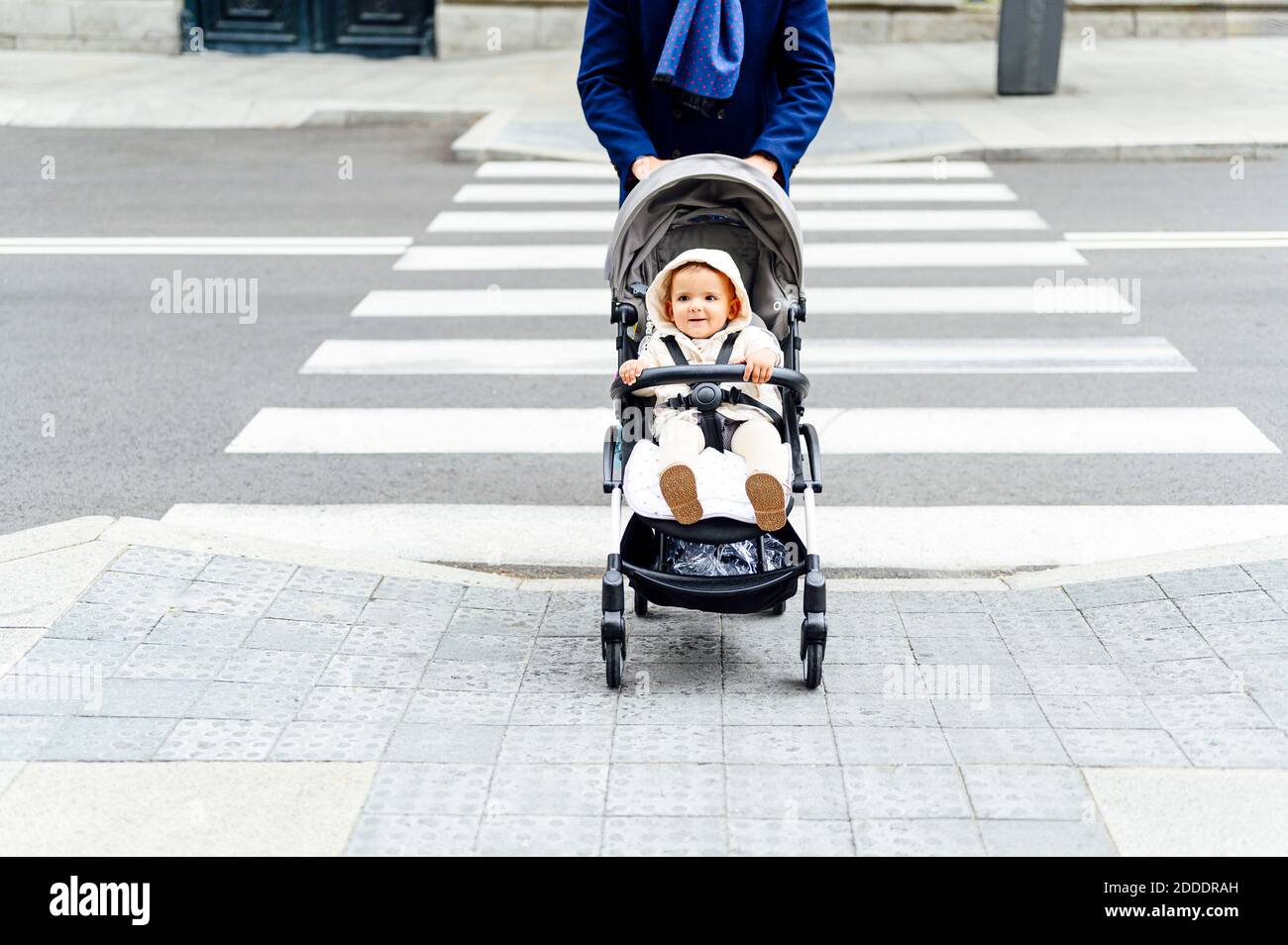 Man boy crossing road hi-res stock photography and images - Alamy