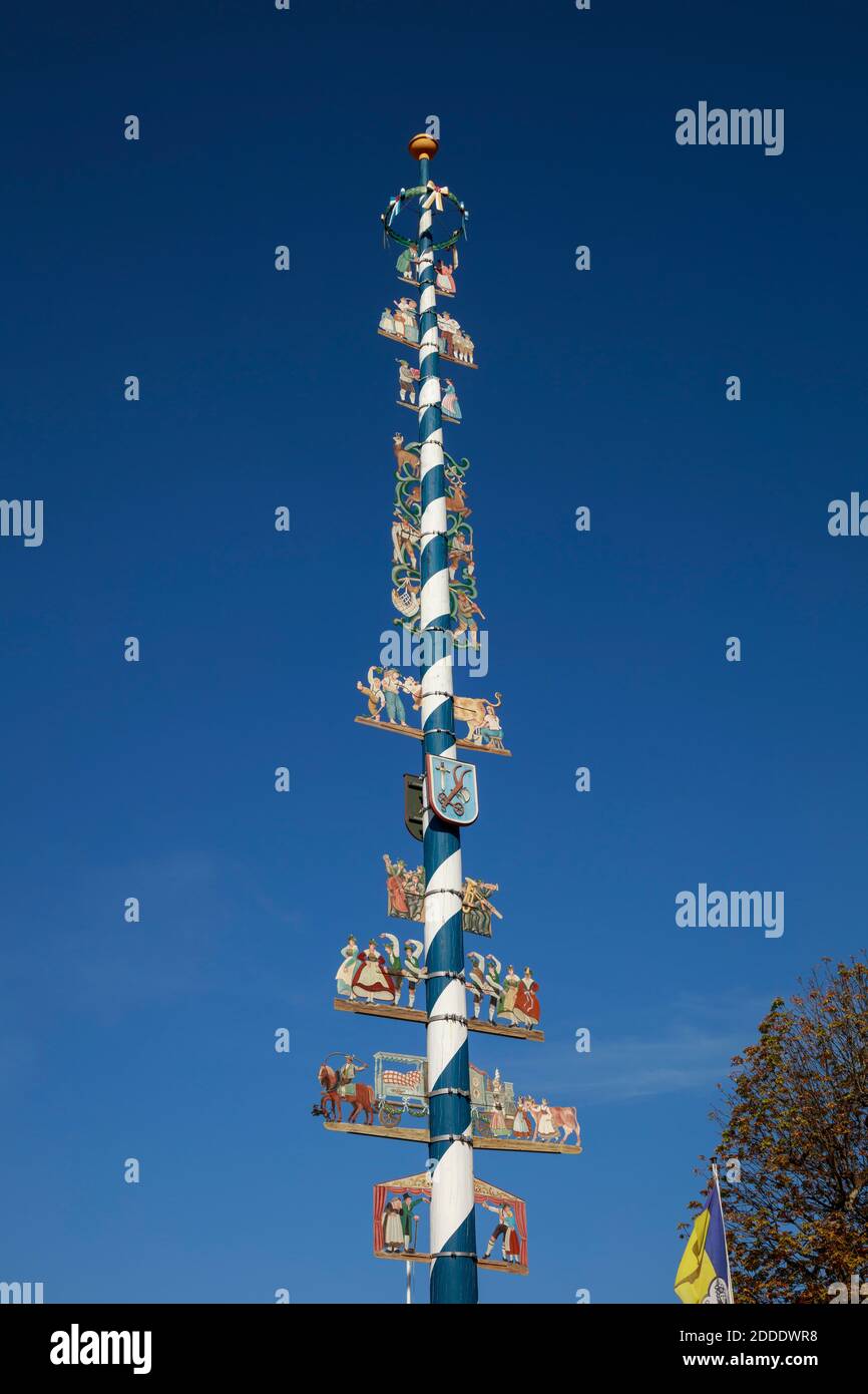 Maypole standing against clear blue sky Stock Photo - Alamy