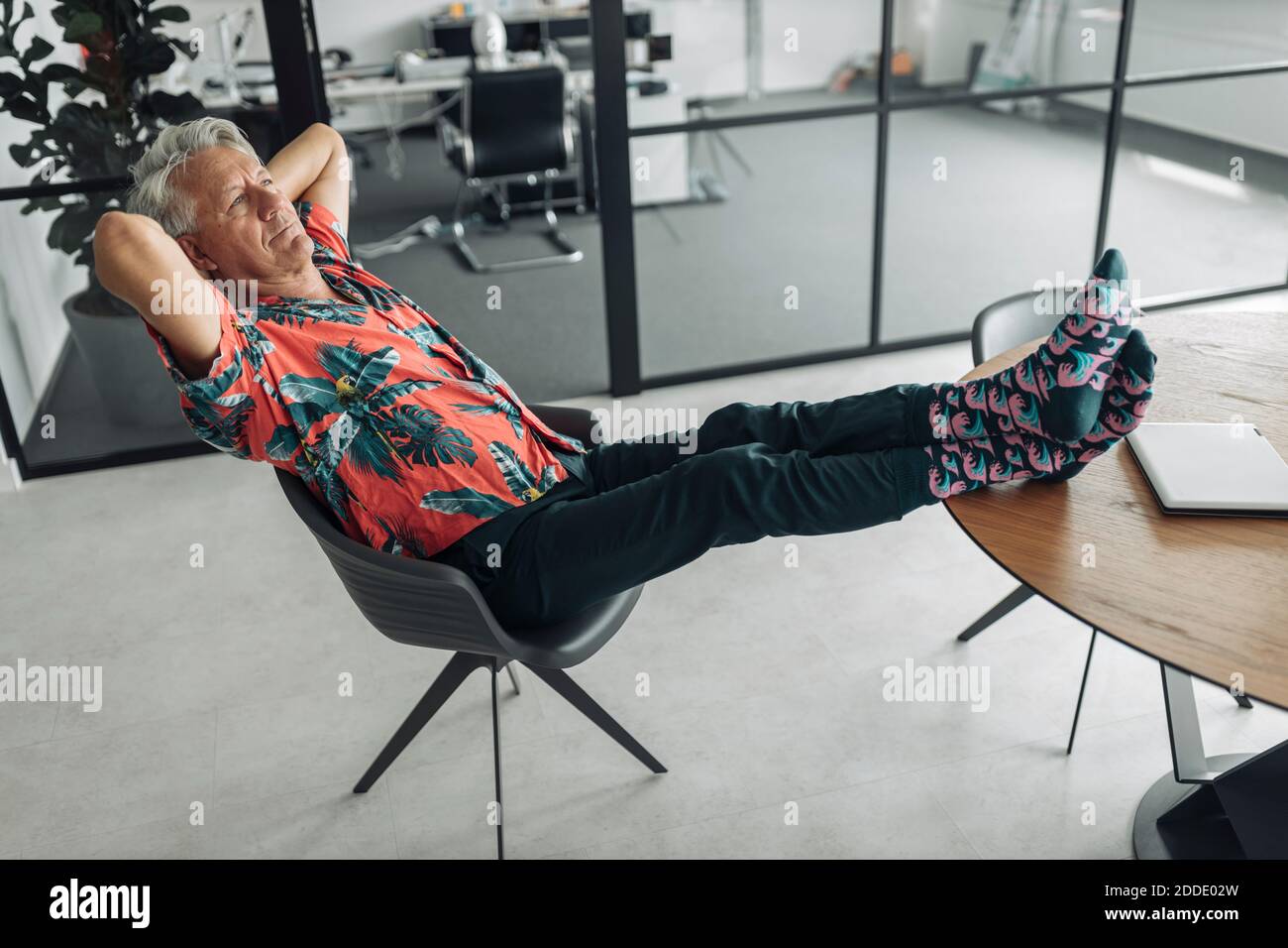 Business people standing on a chair hi-res stock photography and images ...