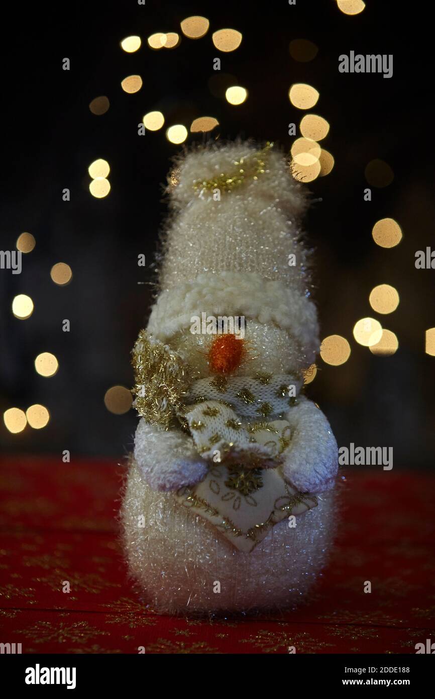 Christmas snowman ornament on lights background Stock Photo - Alamy