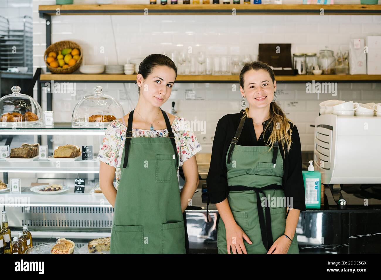Barista behind counter coffee shop hi-res stock photography and images ...