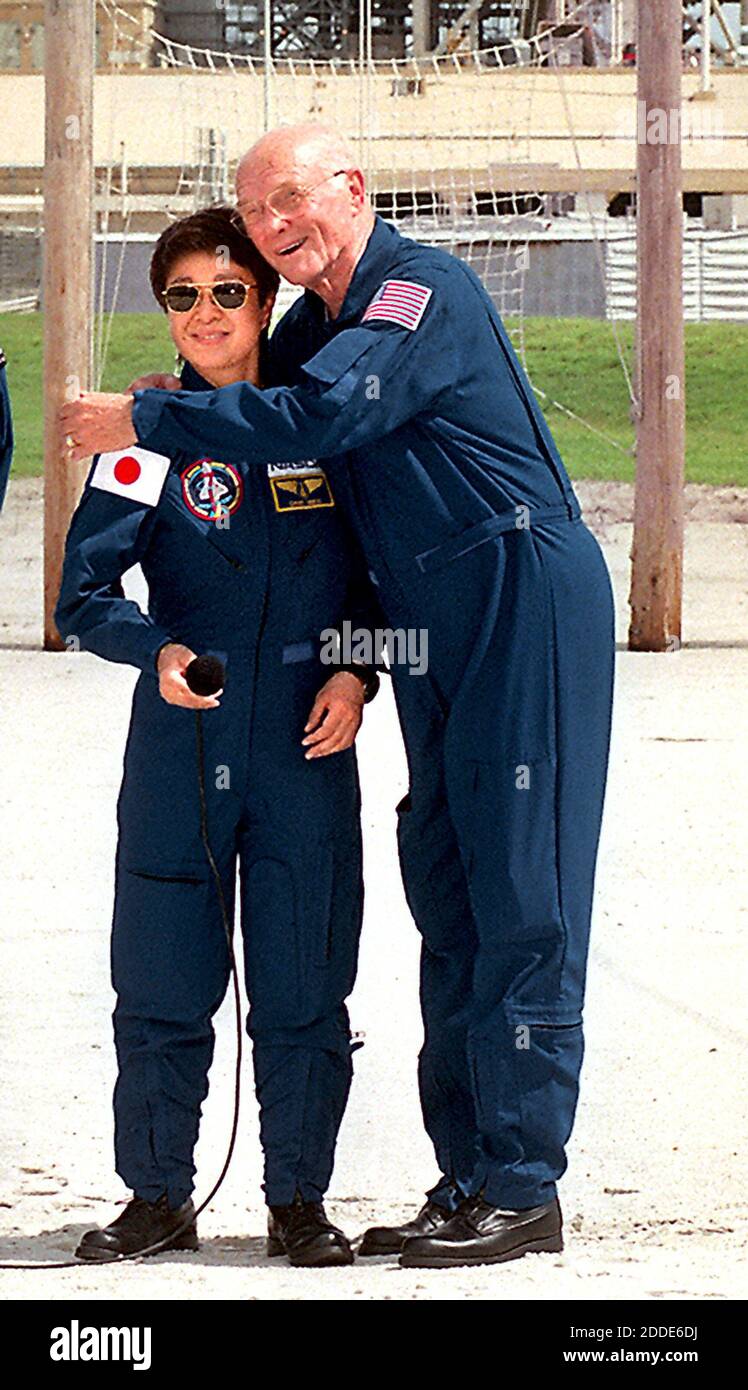 NO FILM, NO VIDEO, NO TV, NO DOCUMENTARY - Sen. John Glenn hugs Chiaki ...