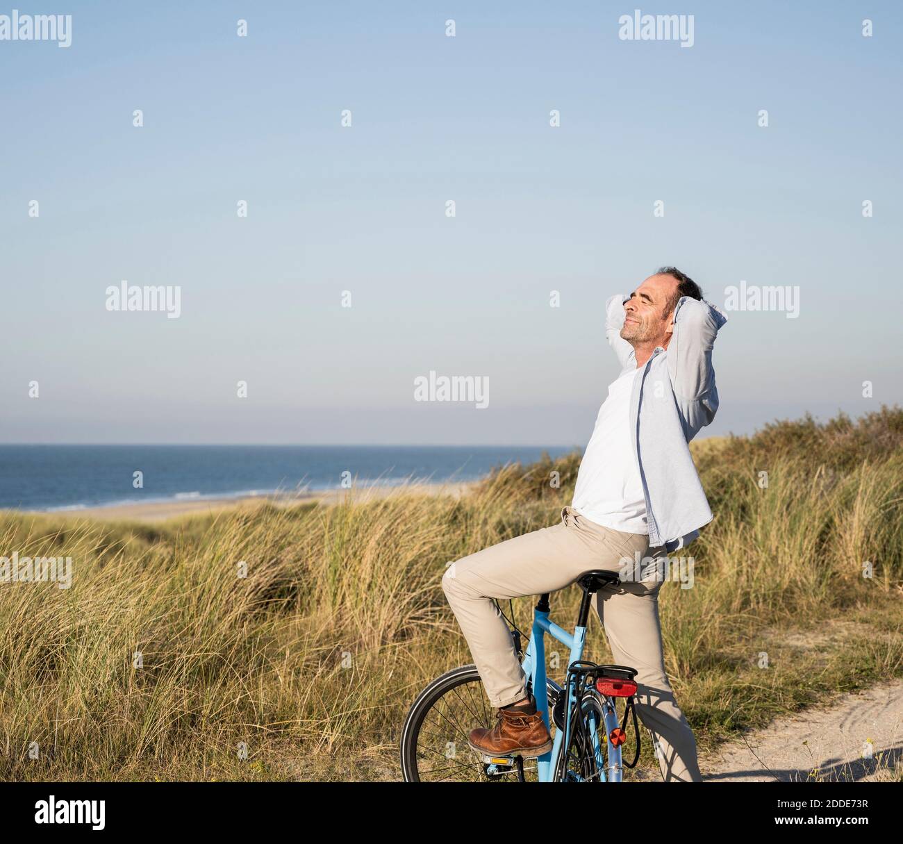 Man on bicycle hi-res stock photography and images - Alamy