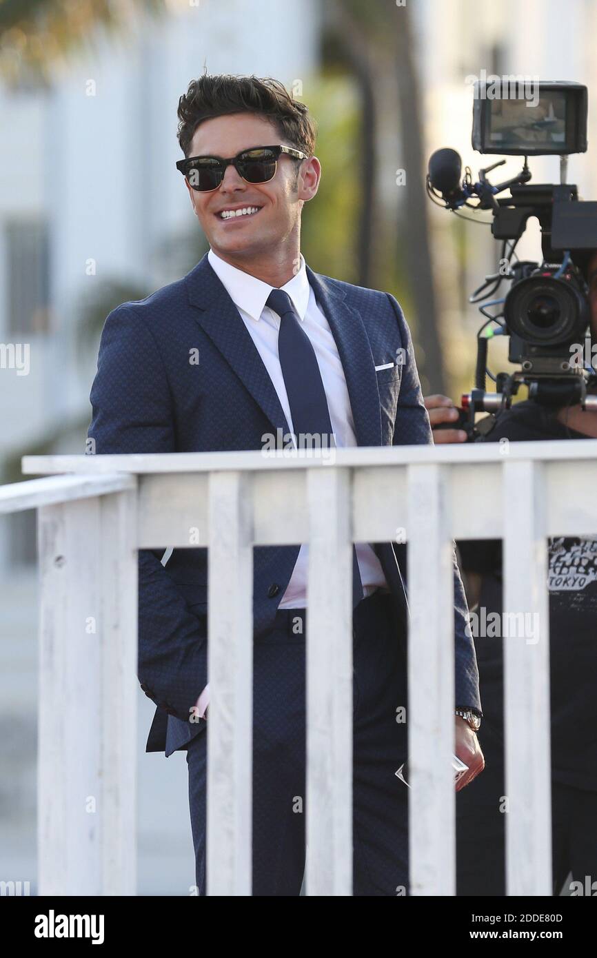 NO FILM, NO VIDEO, NO TV, NO DOCUMENTARY - Zac Efron arrives to the ...