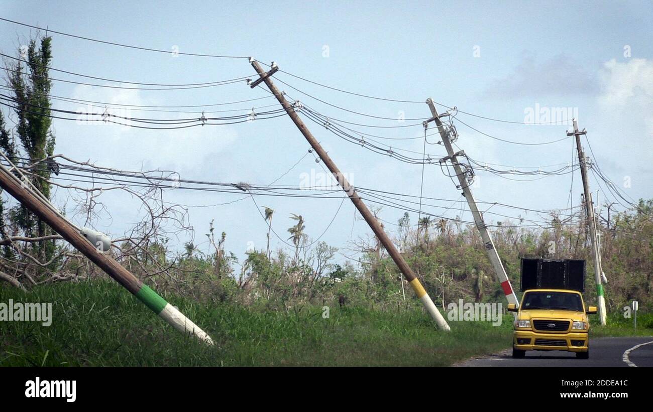 NO FILM, NO VIDEO, NO TV, NO DOCUMENTARY - Power lines hang ...