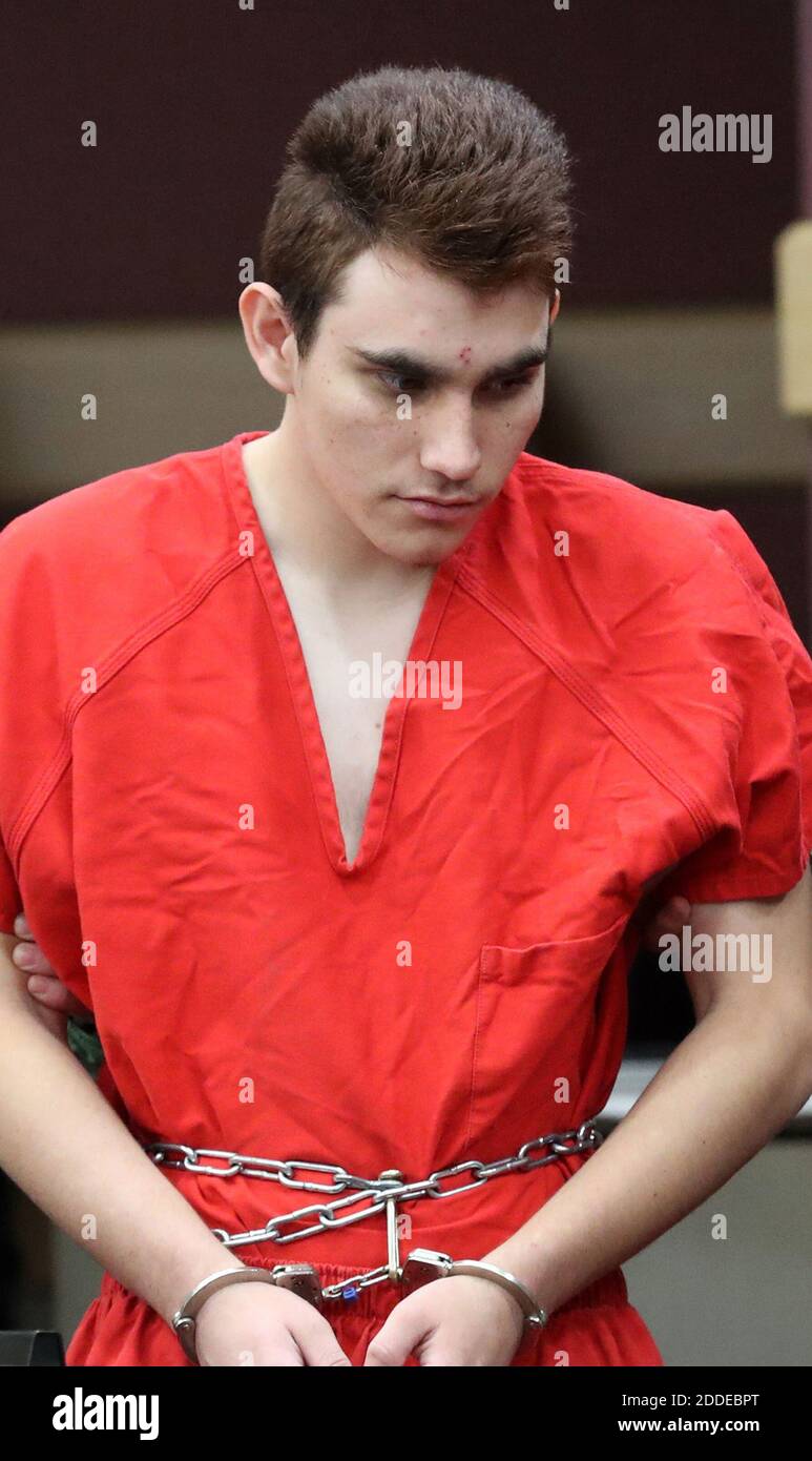 NO FILM, NO VIDEO, NO TV, NO DOCUMENTARY - Nikolas Cruz is escorted ...