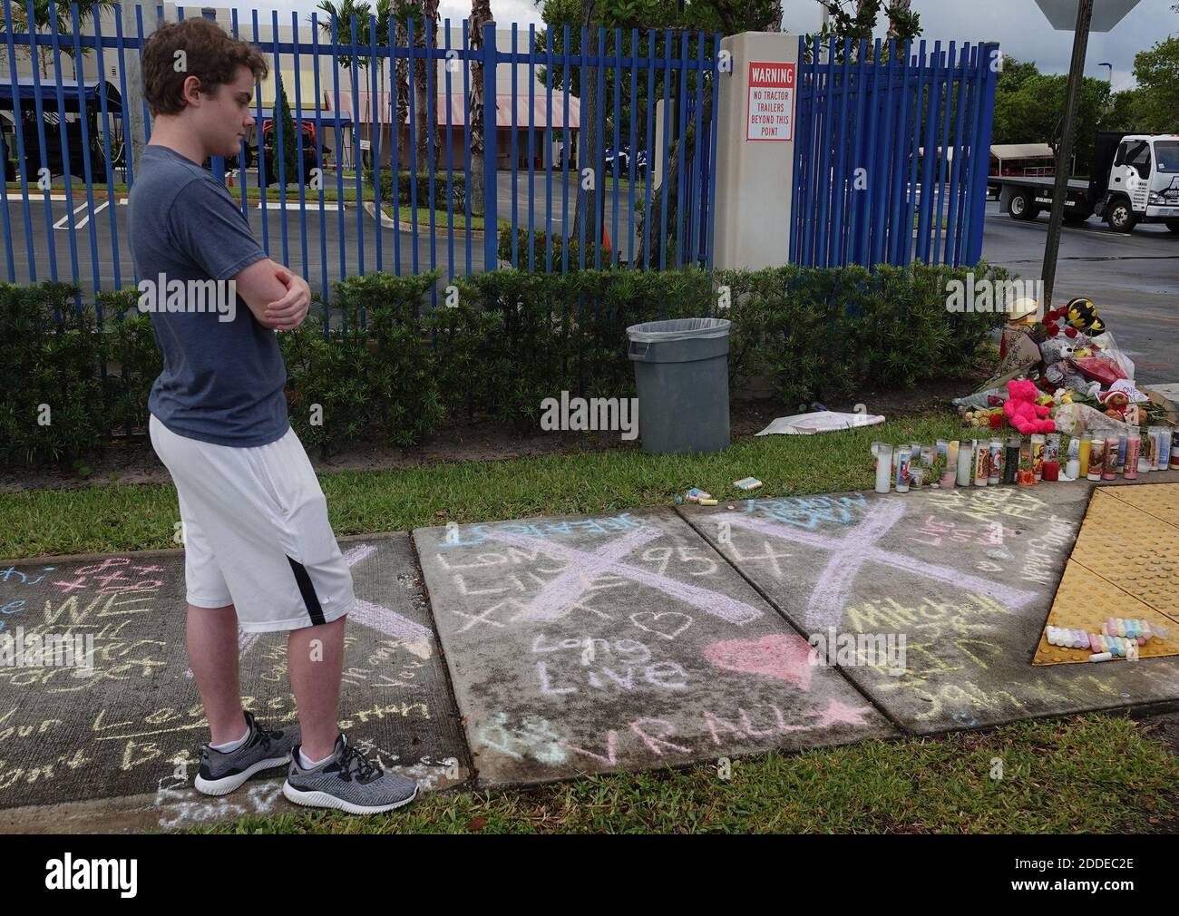 NO FILM, NO VIDEO, NO TV, NO DOCUMENTARY - Fans and mourners of Broward ...