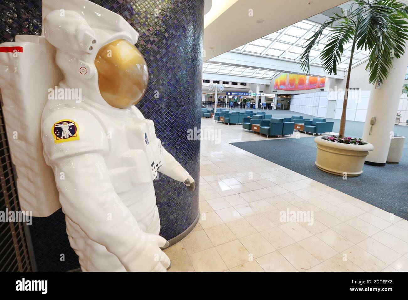 NO FILM, NO VIDEO, NO TV, NO DOCUMENTARY - A NASA astronaut statue ...