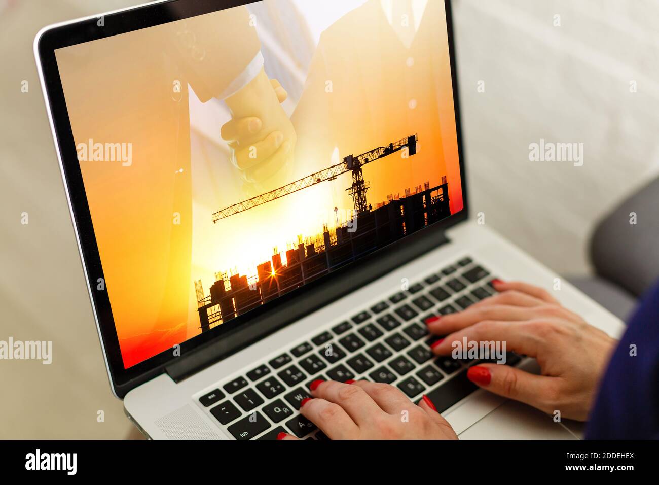 Double exposure one using laptop computer and construction site ...