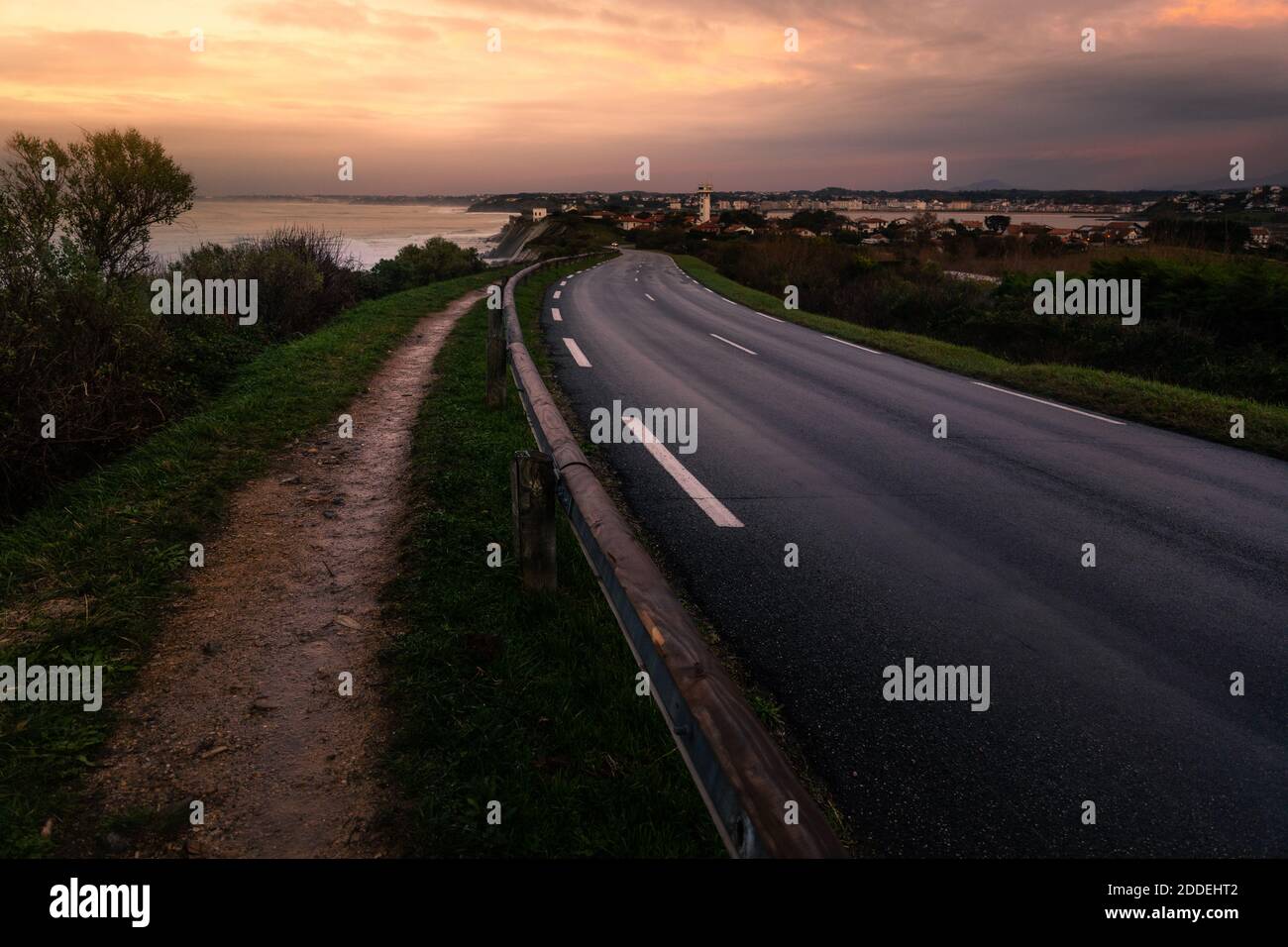 Road next to the coast at the famous basque corniche, Basque Country ...
