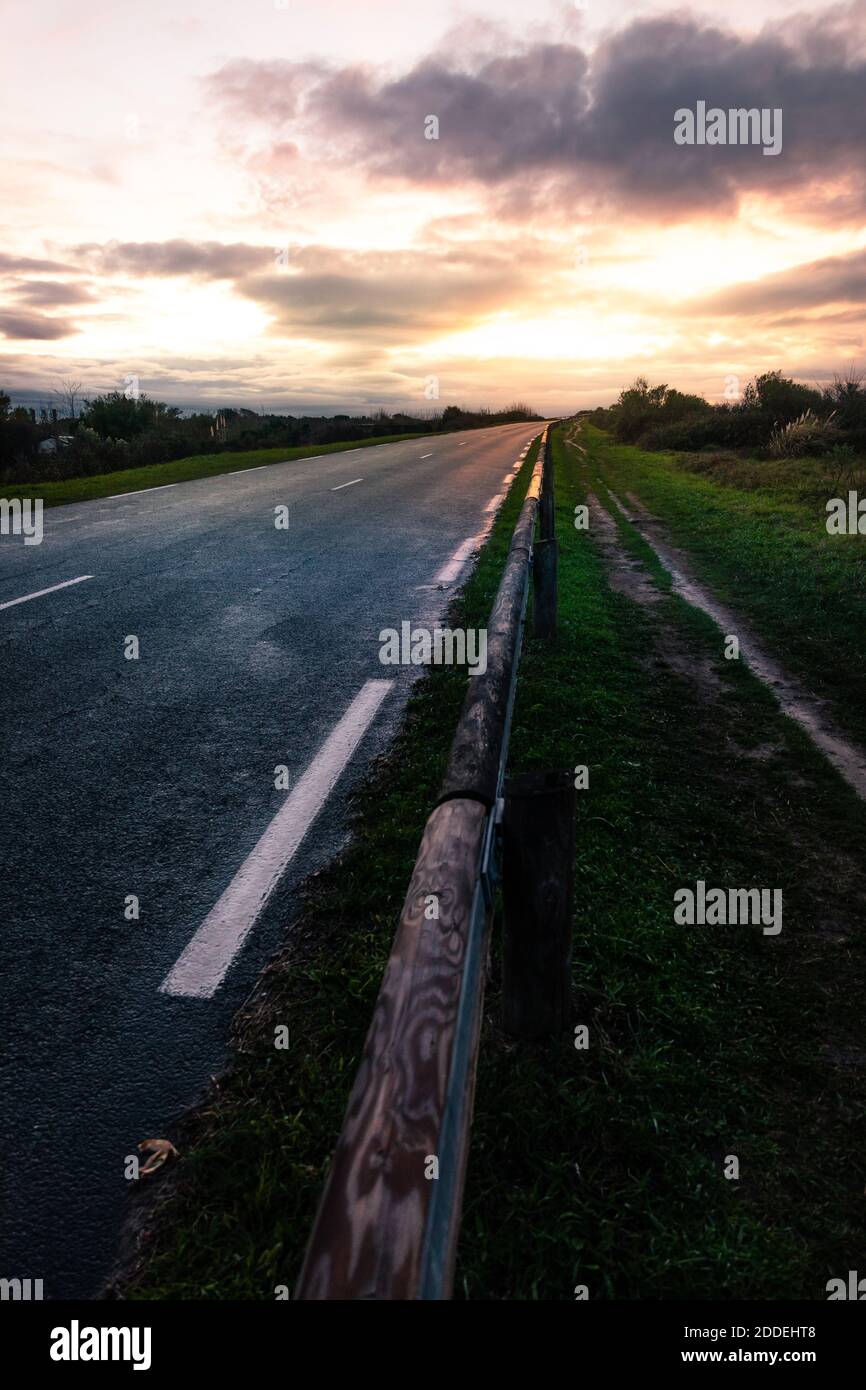 Road next to the coast at the famous basque corniche, Basque Country ...