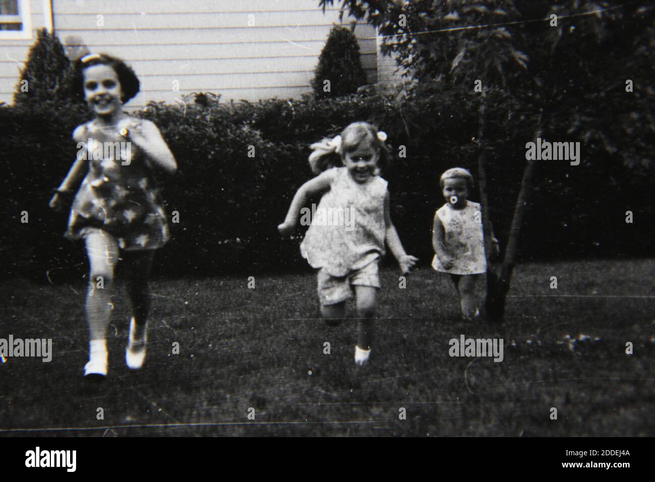 Fine 1970s vintage black and white photography of girls running towards ...