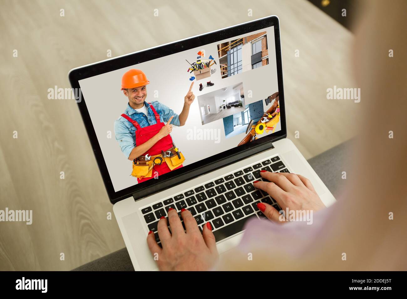 young manual worker displaying laptop over white background Stock Photo ...