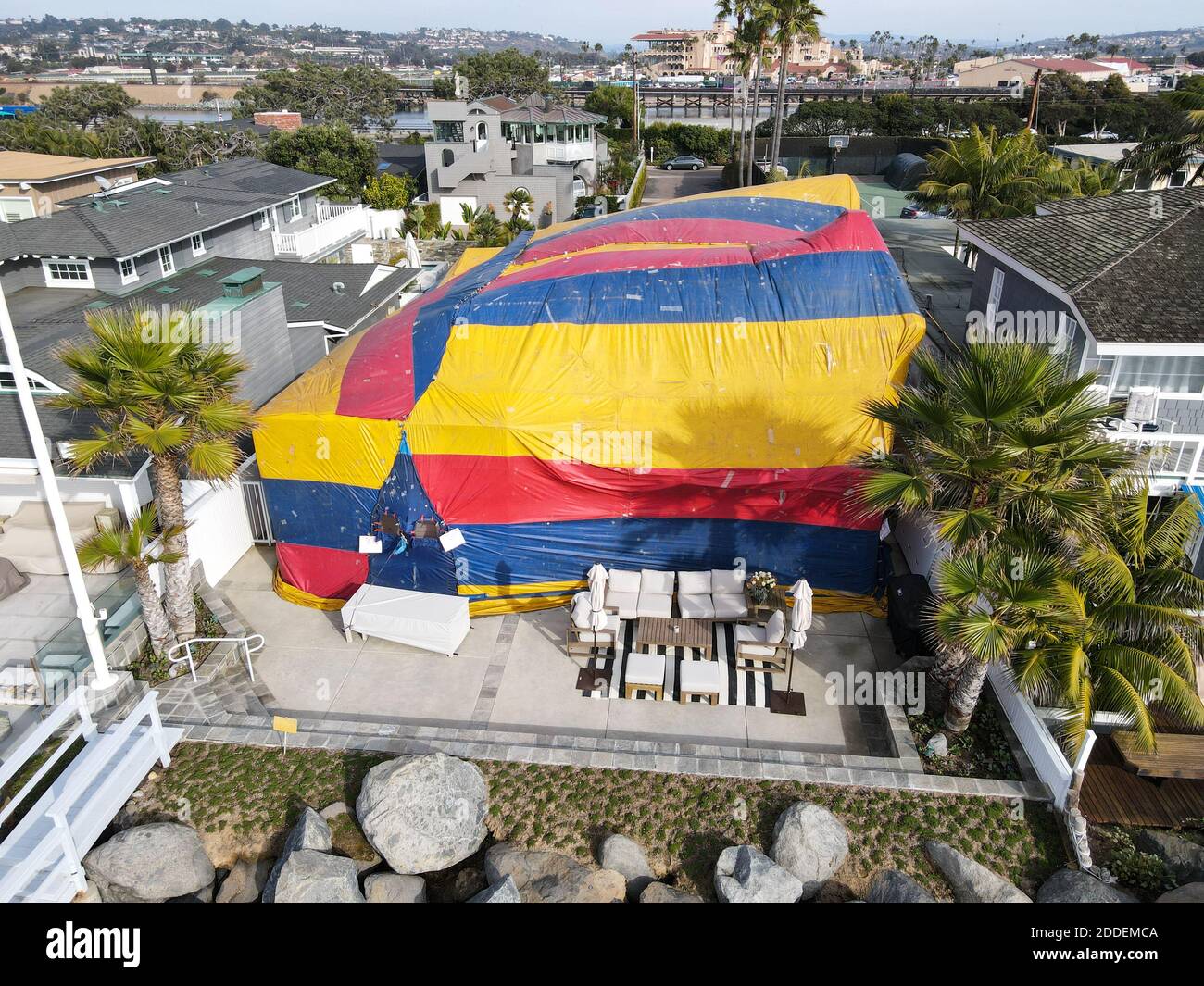Aerial view of residential villa covered with a tent while being ...