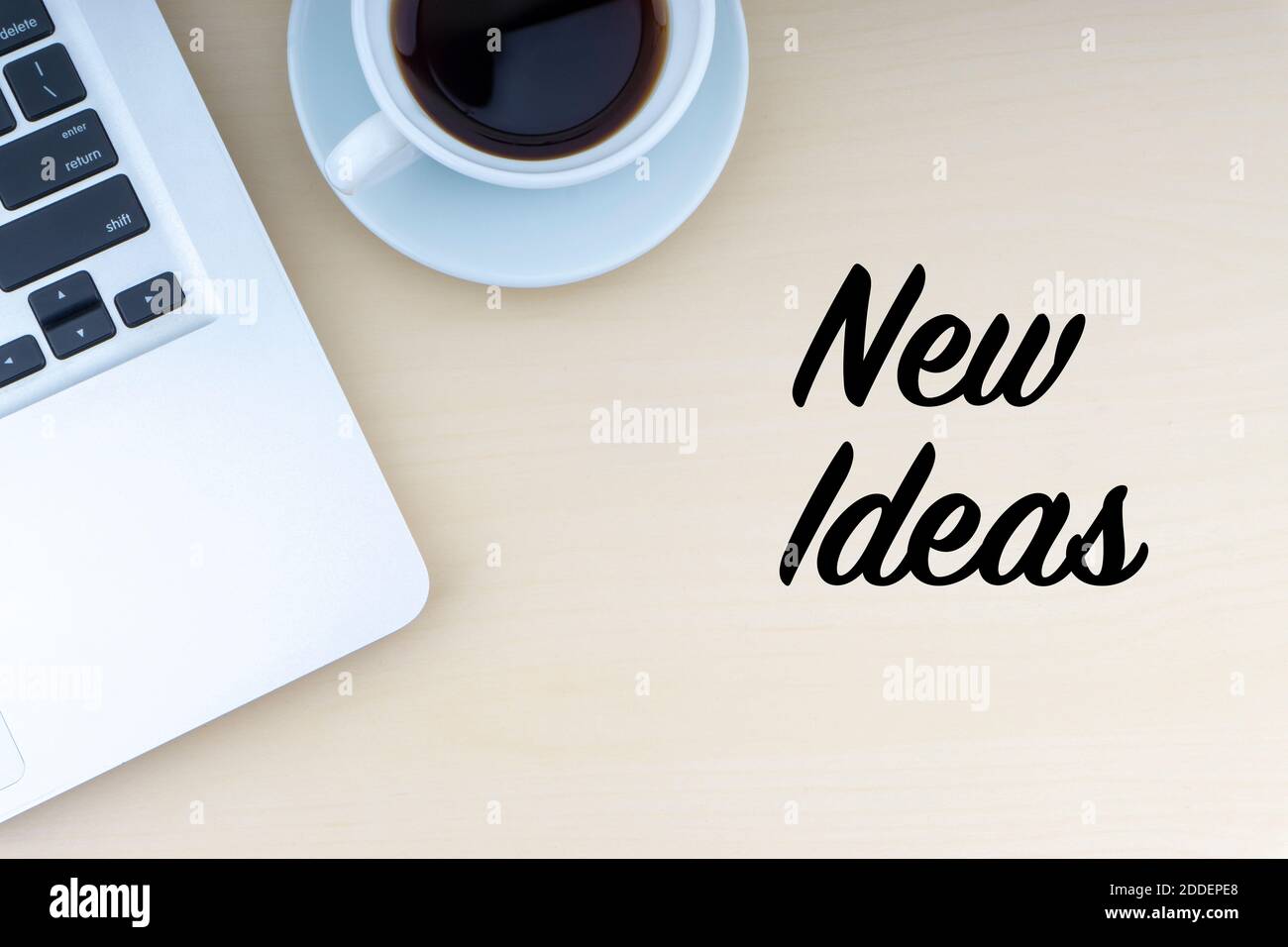 NEW IDEAS text with laptop and cup of coffee on wooden background ...