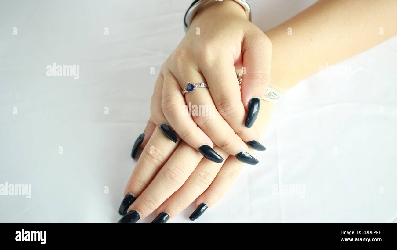 Womens hands up hi-res stock photography and images - Alamy