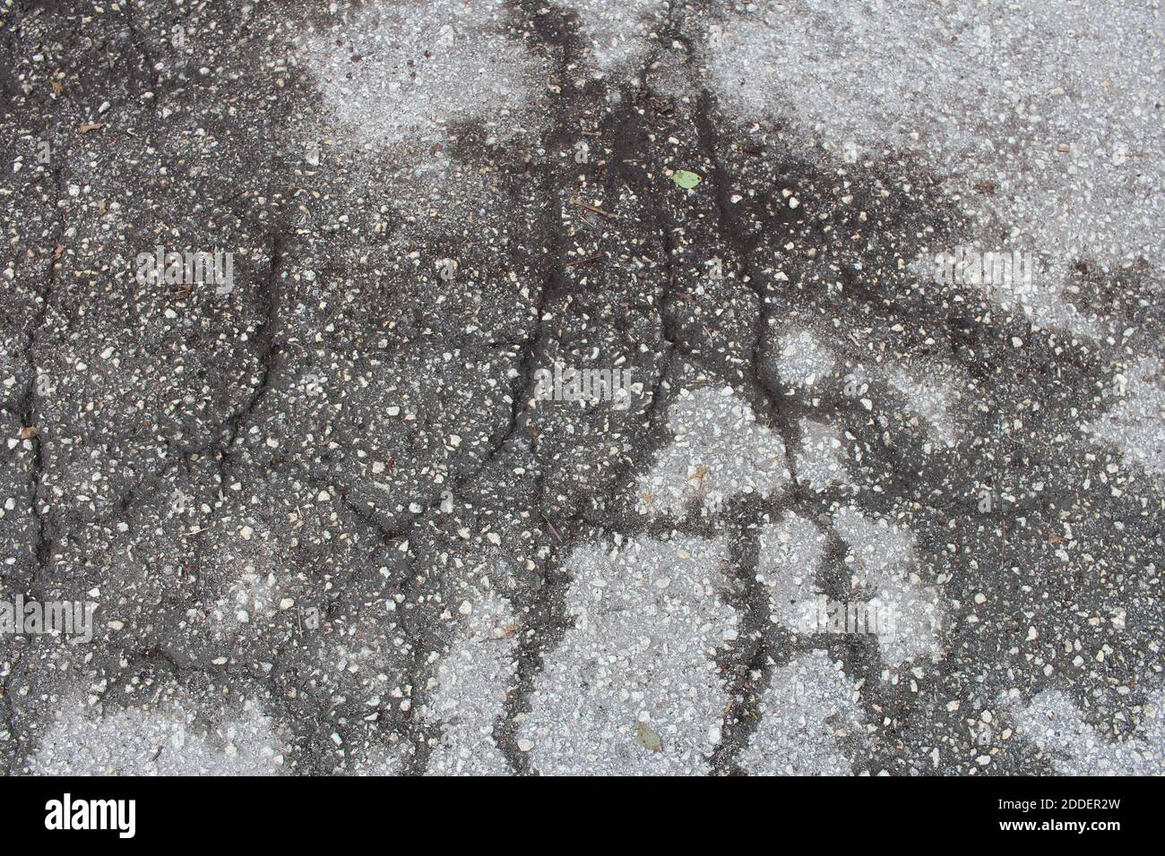 Wet driveway cracks hi-res stock photography and images - Alamy