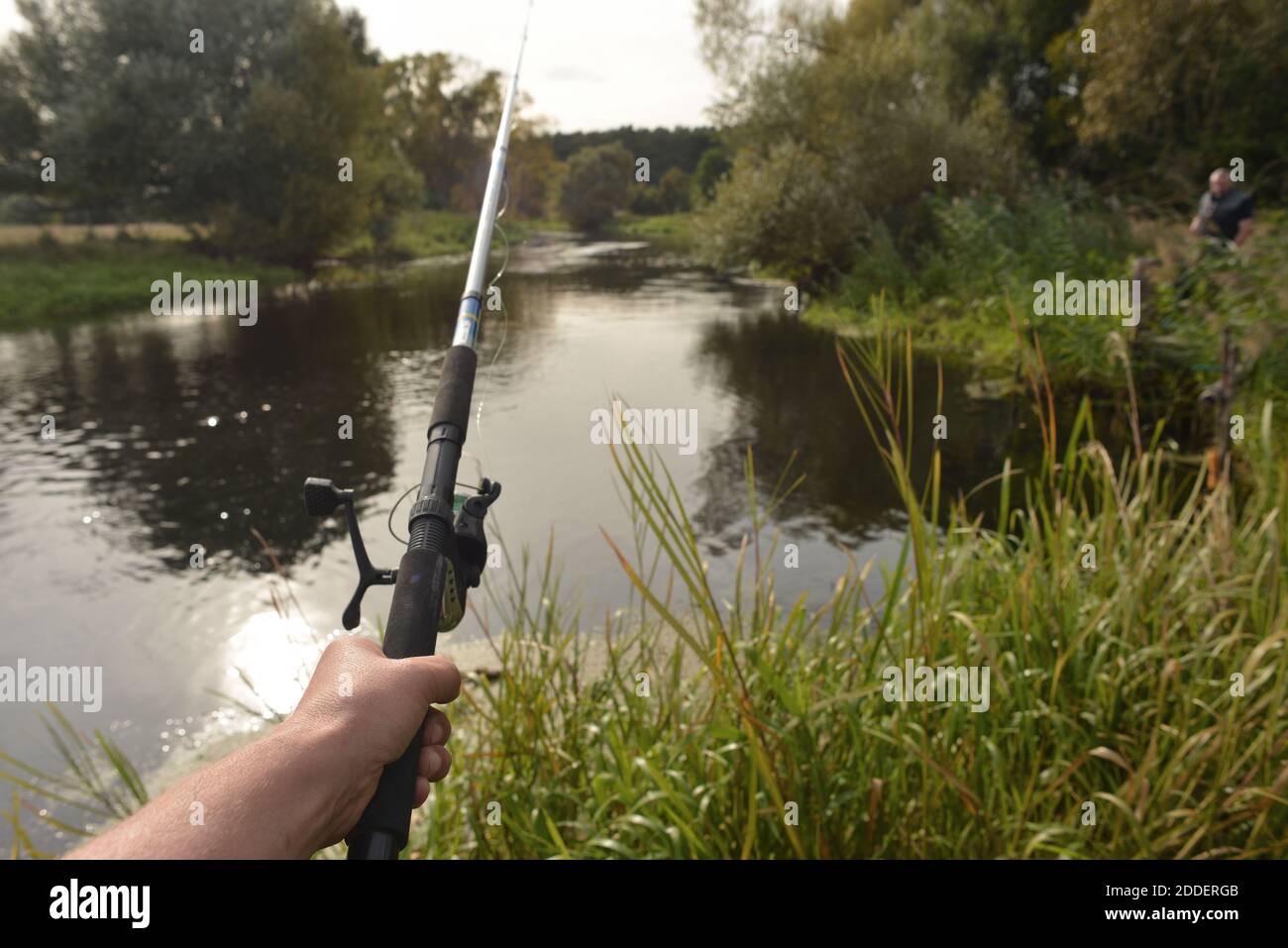 Line fishing on a river in germany Stock Photo - Alamy