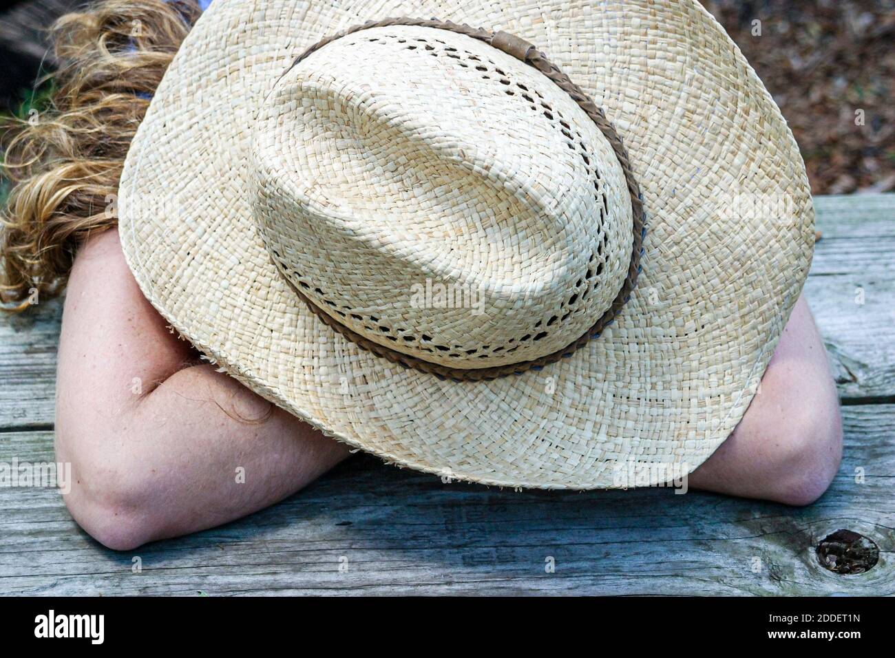 Celebration fair event girl sleeping napping straw cowboy hat hi-res ...