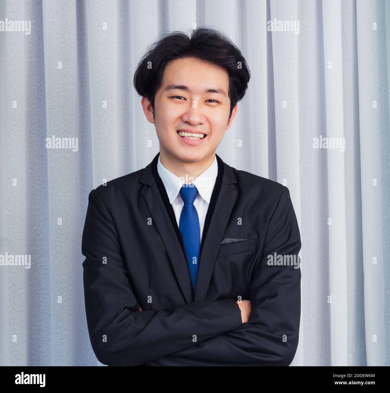 Portrait closeup of happy Asian young handsome manager professional ...