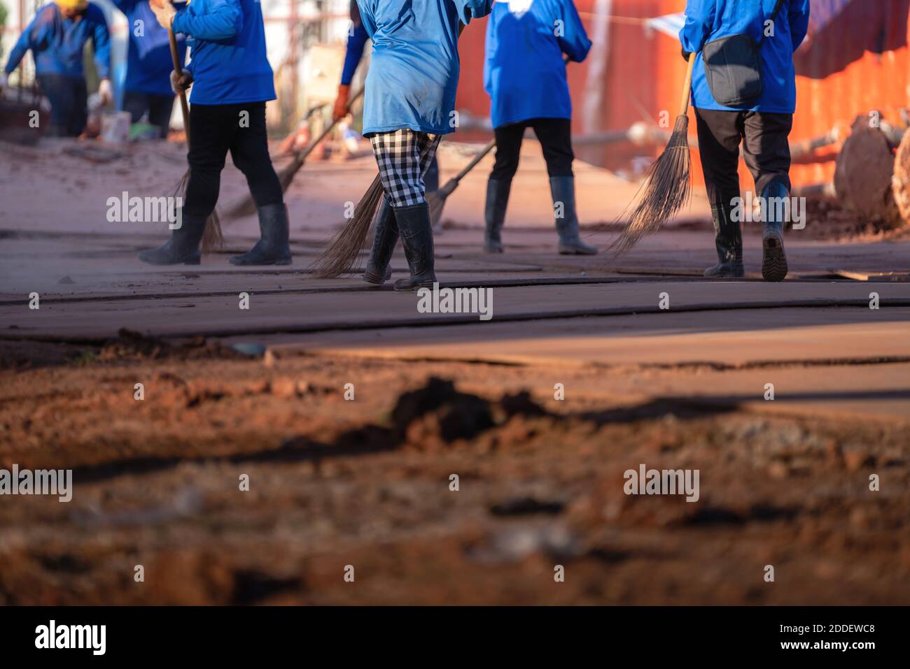 Group female labor on the construction site Stock Photo - Alamy