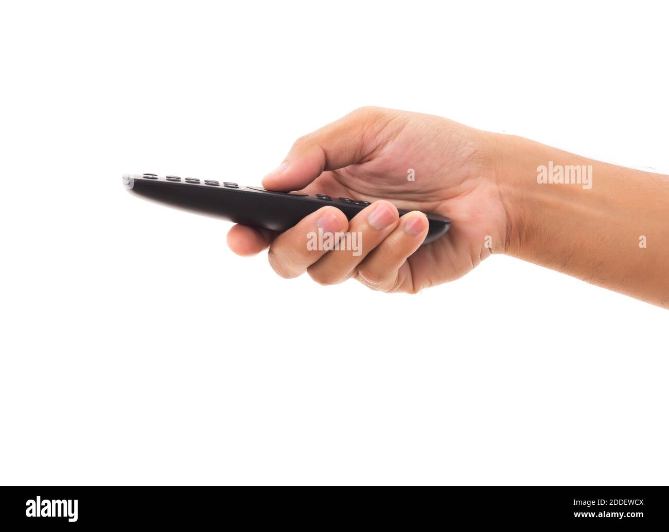 Hand holding television and audio remote control panel, studio shot ...