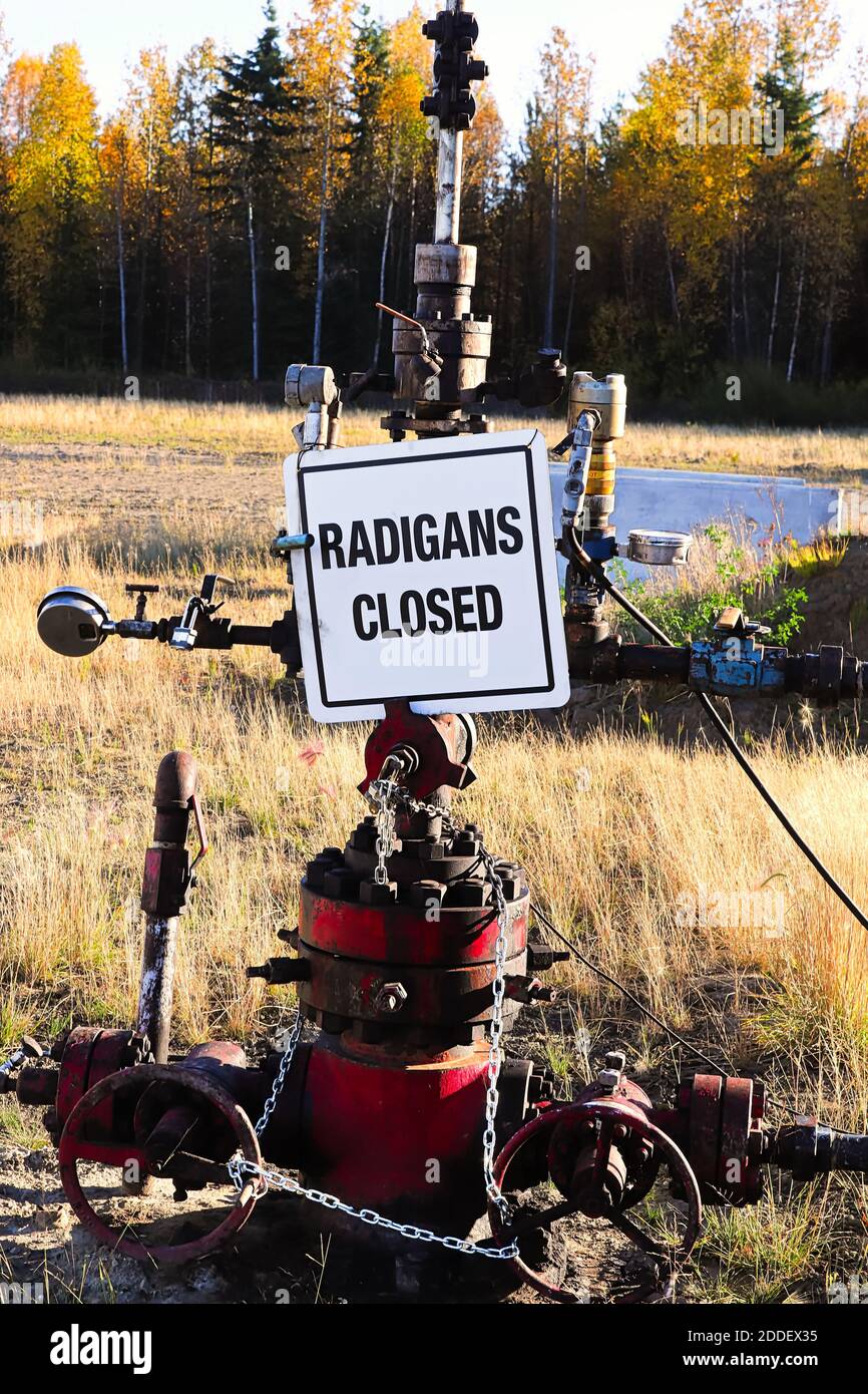 A Radigans Closed sign with equipment chained up Stock Photo - Alamy