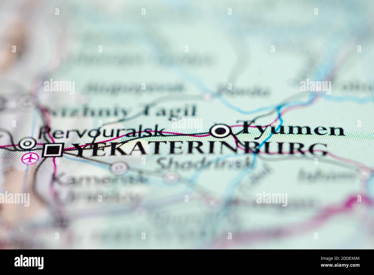 Shallow depth of field focus on geographical map location of ...