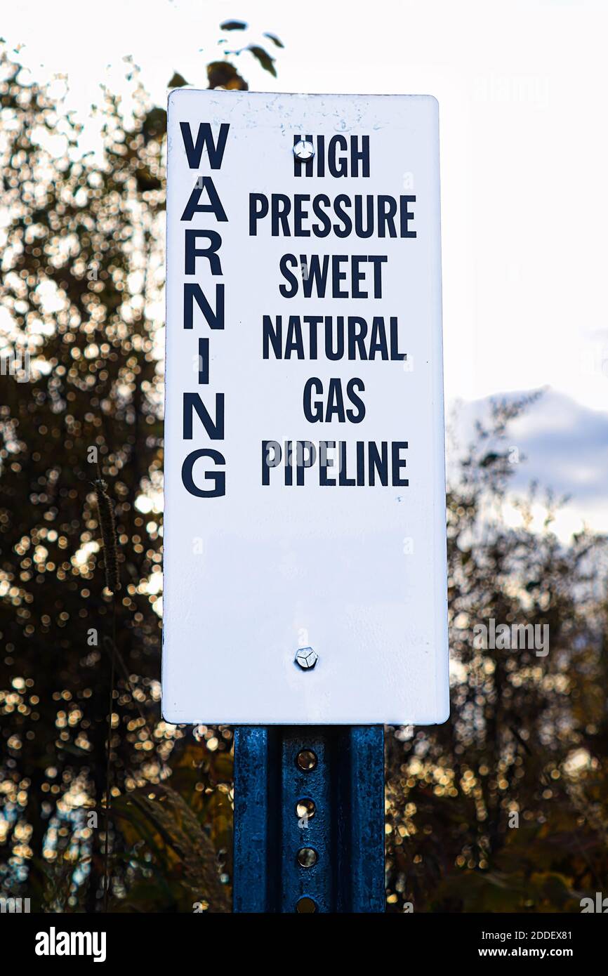 Closeup of a Warning High Pressure Gas Pipeline sign Stock Photo - Alamy