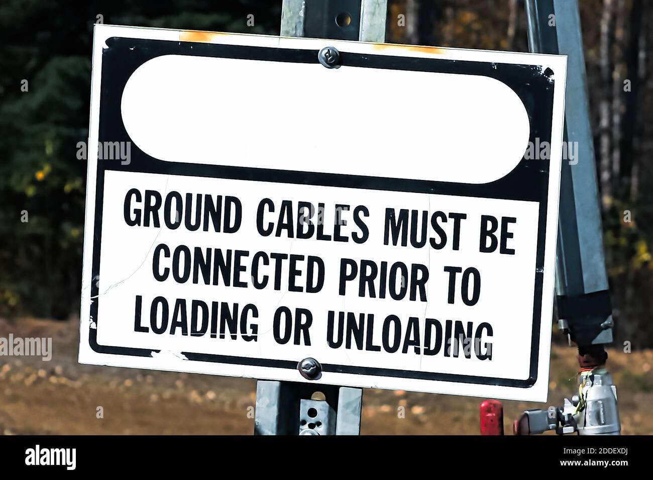 A Ground Cables Must Be Connected sign Stock Photo - Alamy