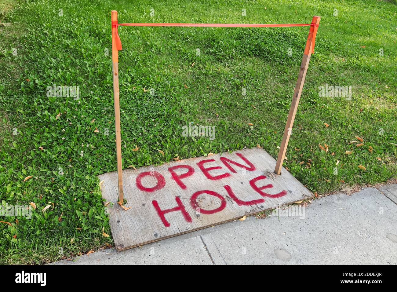 An Open Hole sign spray painted on plywood Stock Photo - Alamy