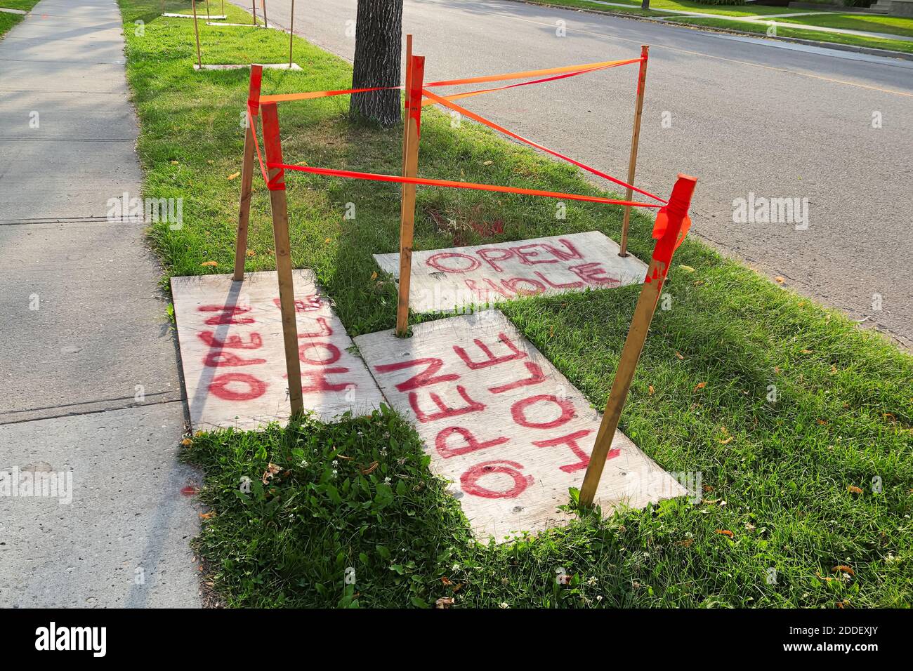 A warning of Opes Hole signs in a cluster Stock Photo - Alamy