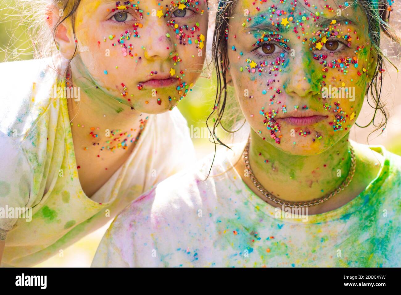 Children with paintings face. Close up portrait of a kids looking at ...