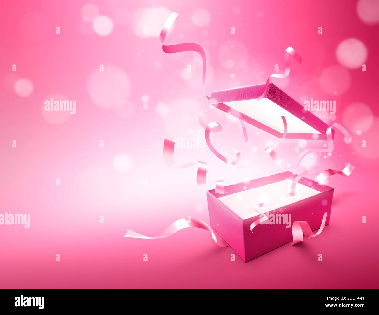 Ribbons bursting out from pink color open gift box Stock Photo - Alamy