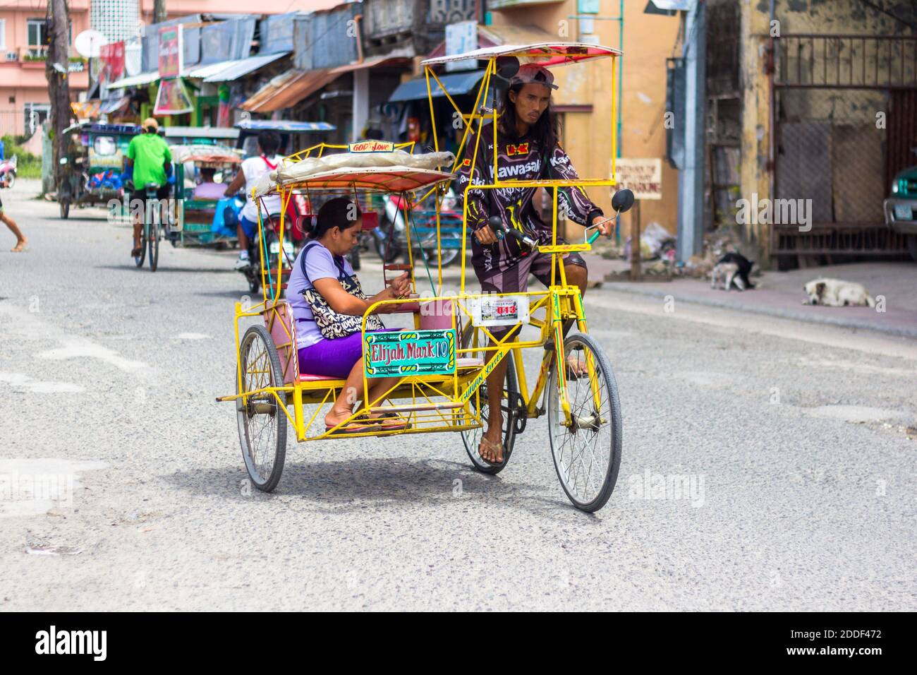 A local pedicab plying the streets of Samar, Philippines Stock Photo ...