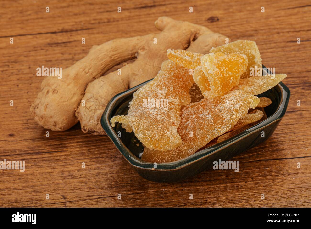 Dry sweet ginger snack in the bowl Stock Photo - Alamy