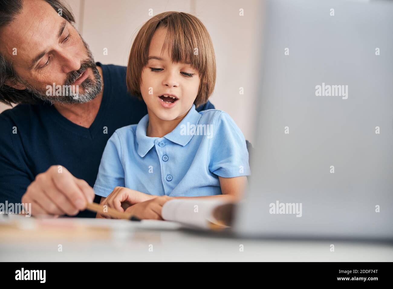 Kid making first steps in the educational process Stock Photo - Alamy
