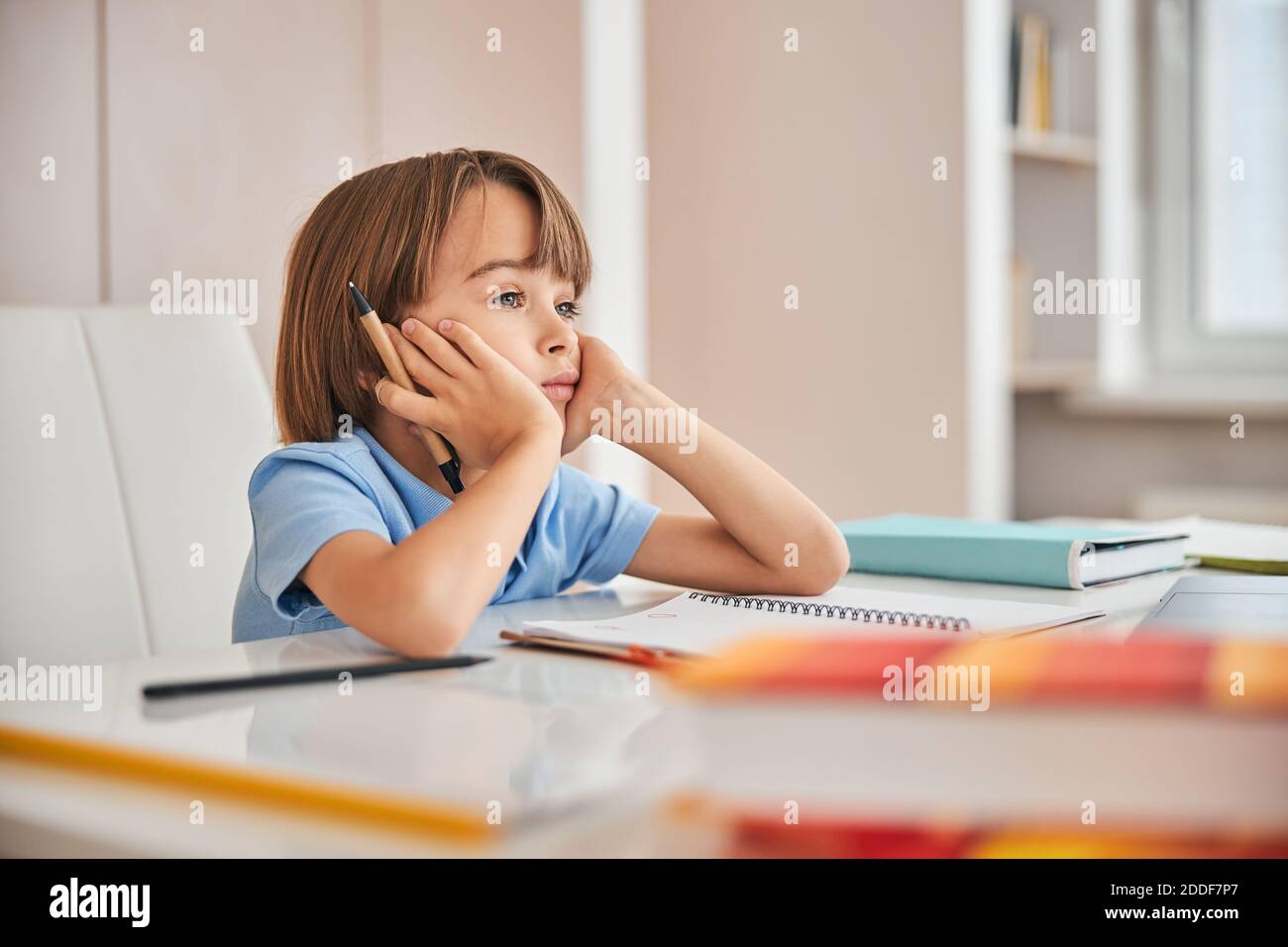 Child having too much homework during the distant learning Stock Photo ...