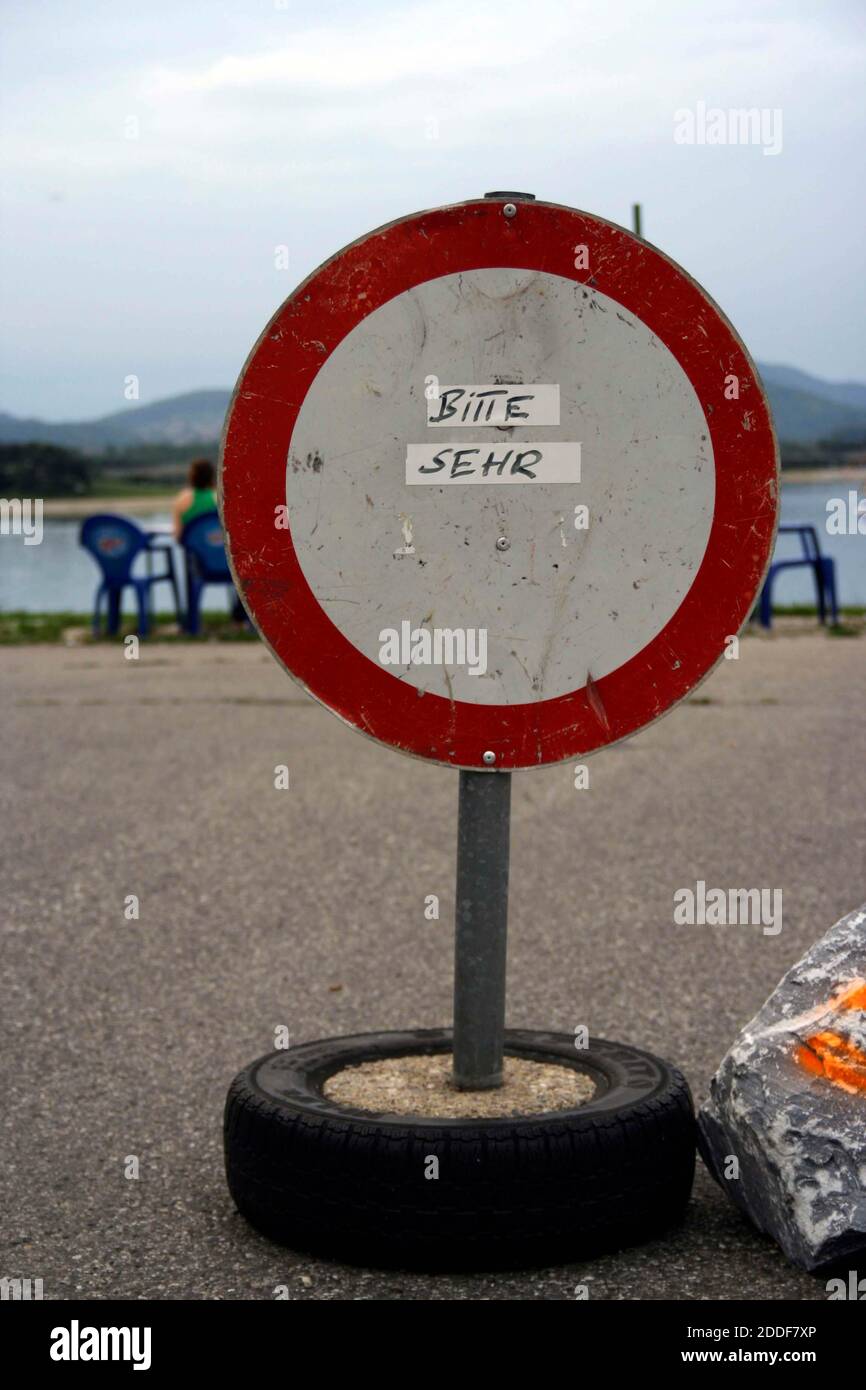 no driving or driving ban traffic sign, round red circle with white ...