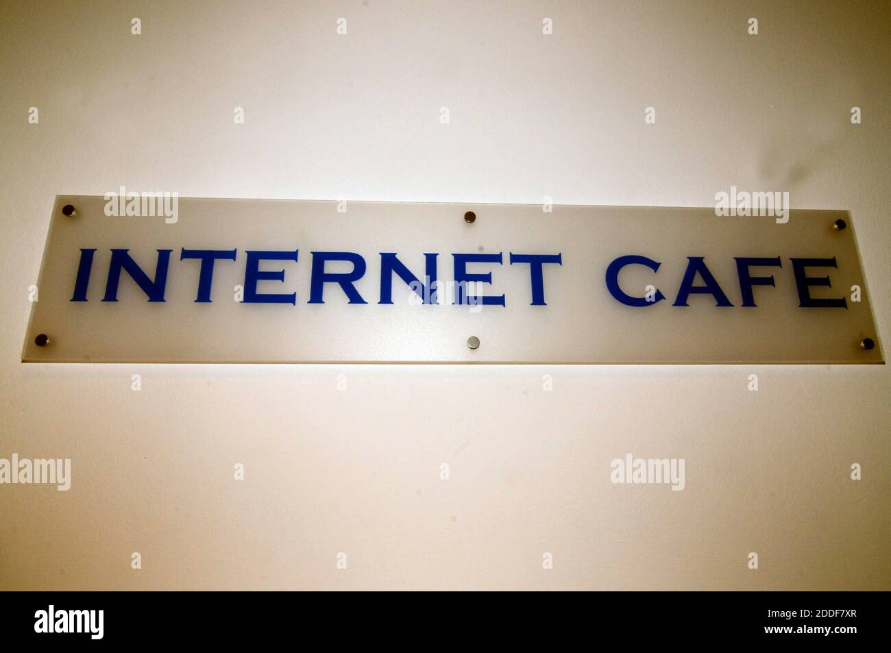 Internet Cafe sign with blue font, online connection and access Stock ...