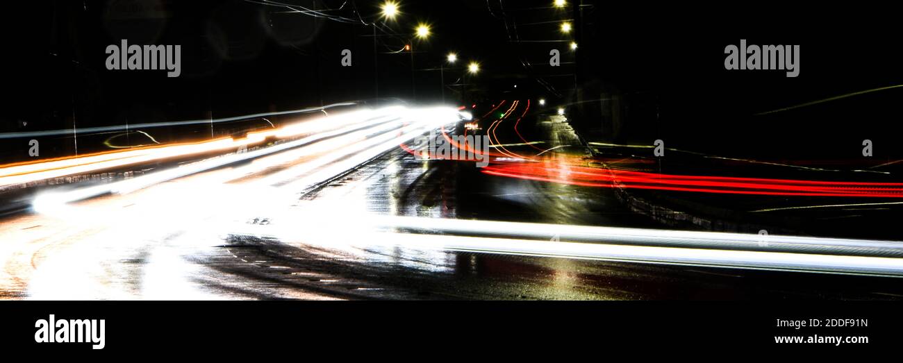 Lights of cars at night. Street lights. Night city. Long-exposure ...