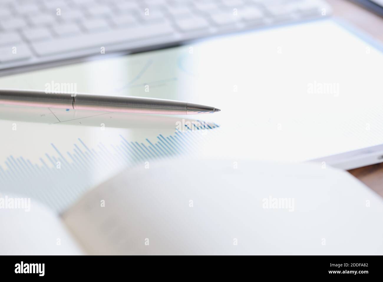 On table is a keyboard tablet and diary Stock Photo - Alamy