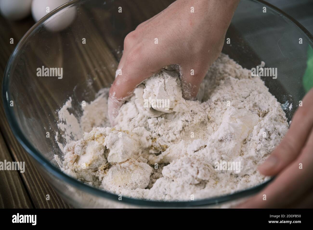 The cook mixes ingredients for apple pie. Ingredients for baking fresh ...