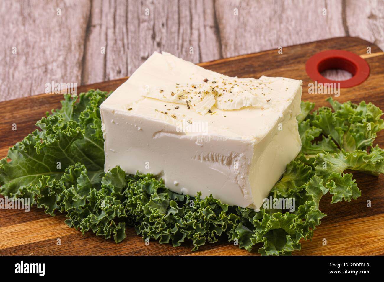 Traditional tasty Greek Feta soft cheese brick Stock Photo - Alamy