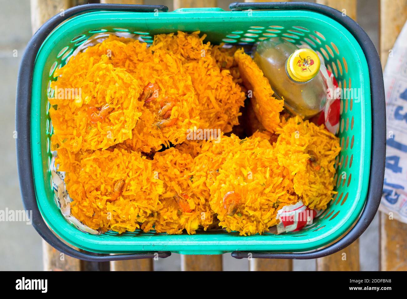 A basket of shrimp fritters locally called okoy sold by a vendor in ...