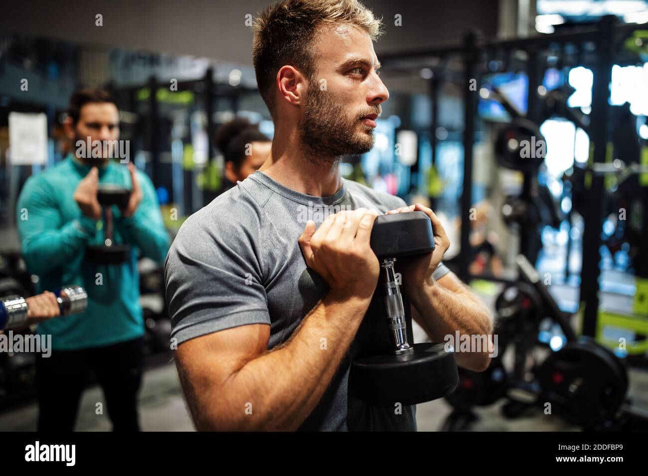 Handsome muscular fit young man hi-res stock photography and images - Alamy
