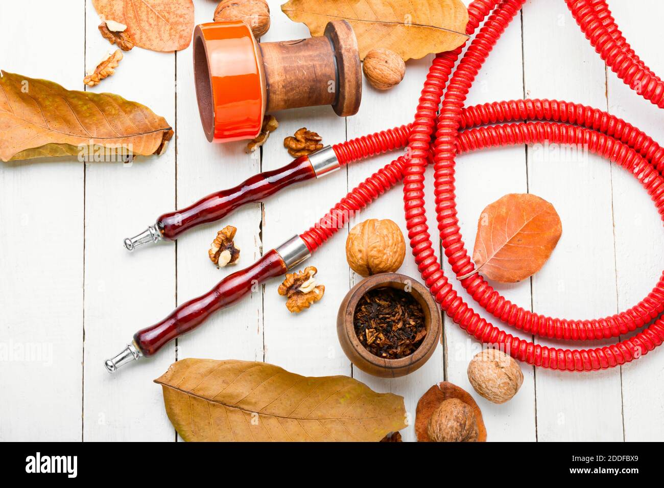 Smoking shisha or hookah with walnut flavored tobacco Stock Photo - Alamy