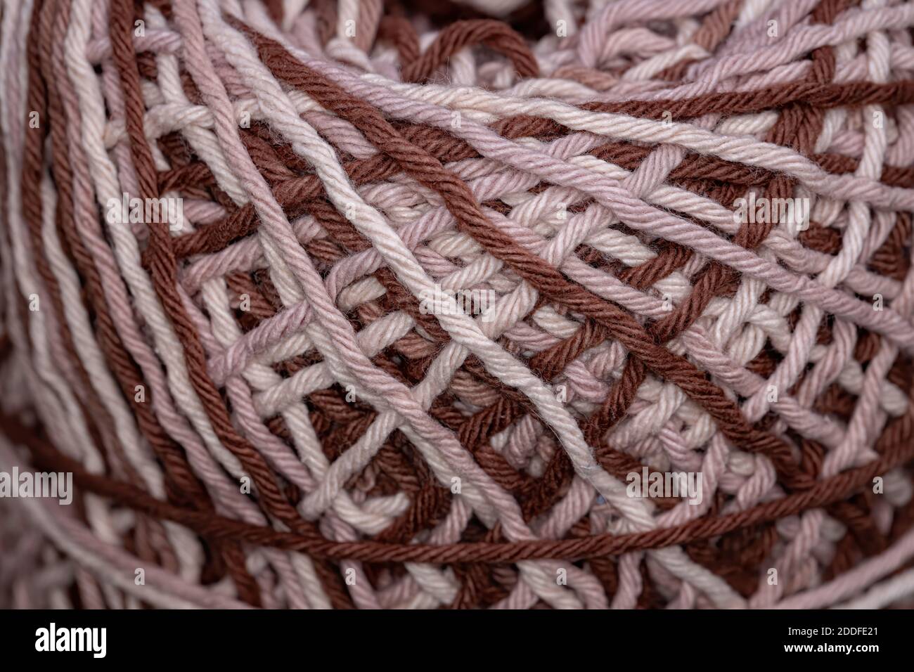 Roll of brown crochet yarn in macro view with selective focus Stock ...