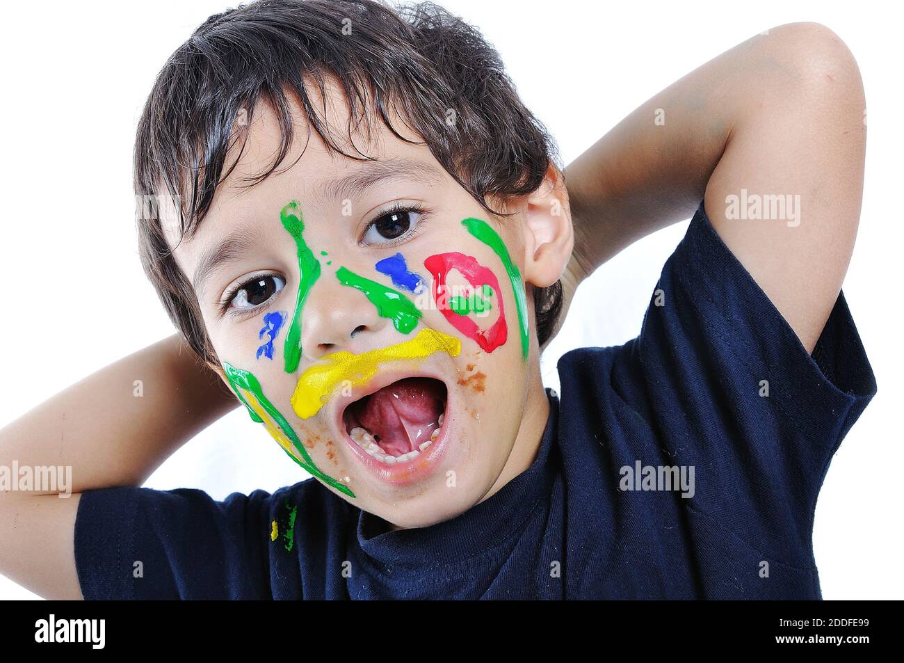A little cute child with colors on white Stock Photo - Alamy